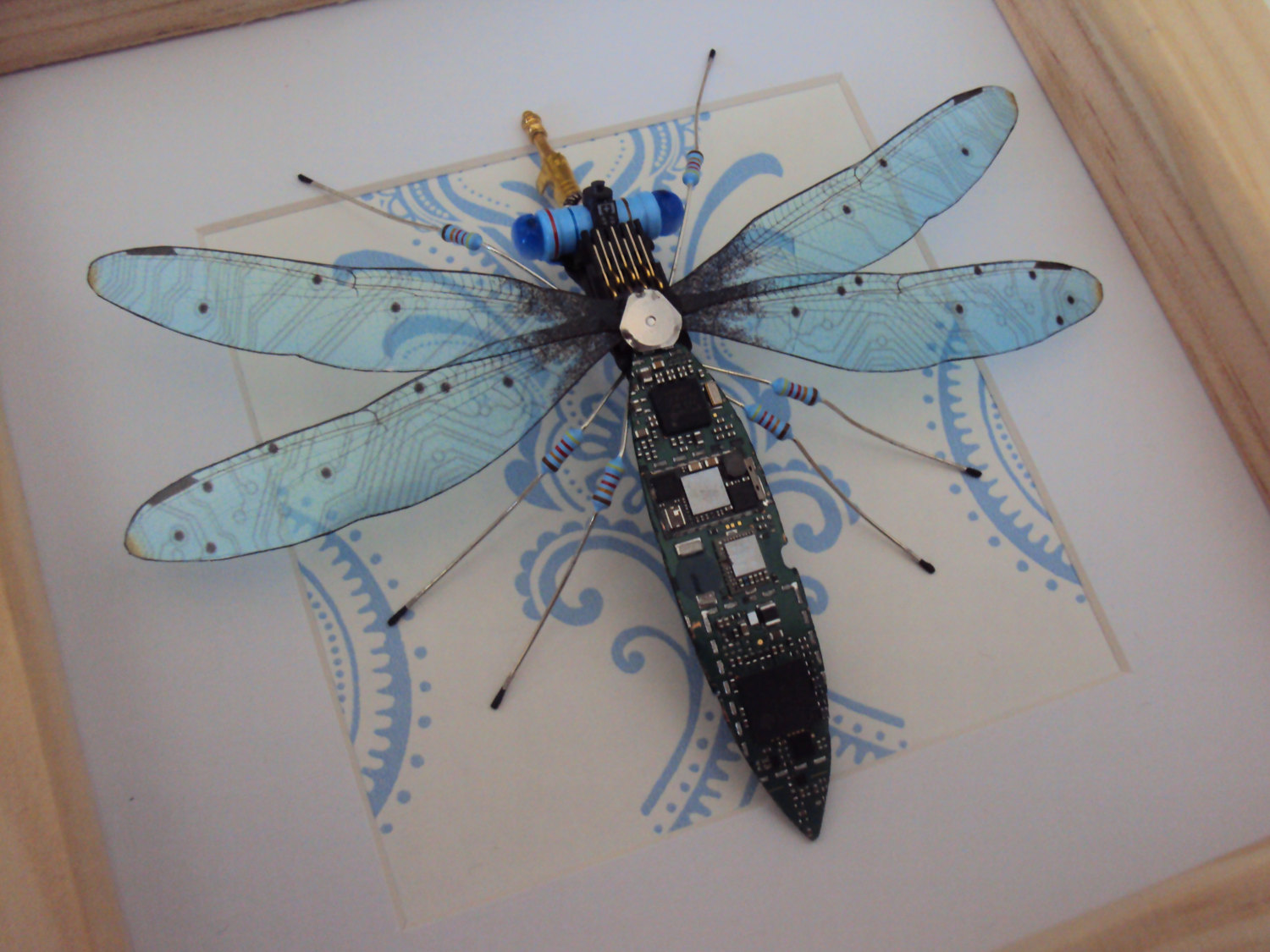 Iridescent insect sculptures from ewaste - Boing Boing