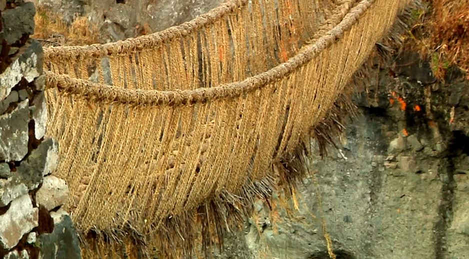 Every year, this scary rope bridge over a river must be replaced ...
