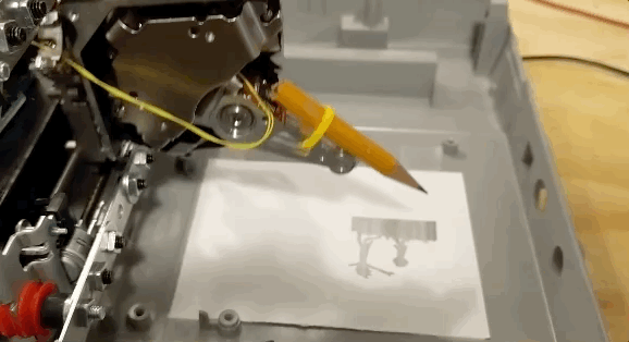 A dot-matrix printer that taps out a picture using a pencil / Boing Boing