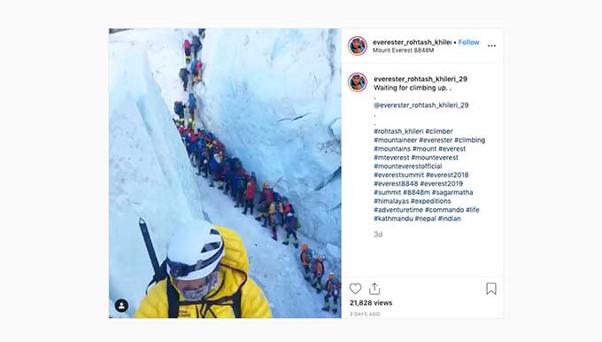 Look at this crowded line of people waiting for their turn to climb Mt ...